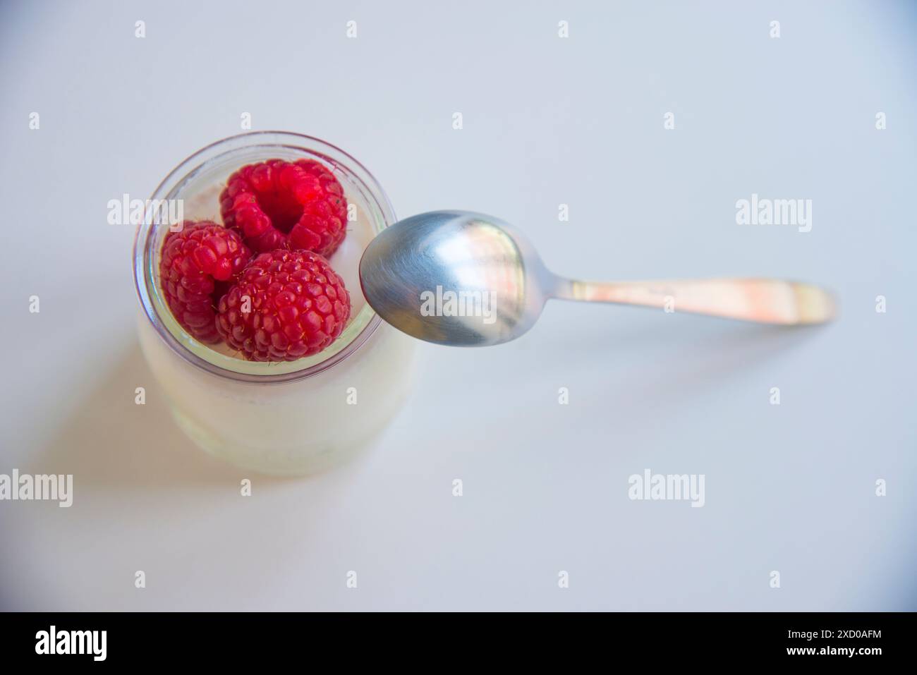 Yoghurt with raspberries Stock Photo - Alamy