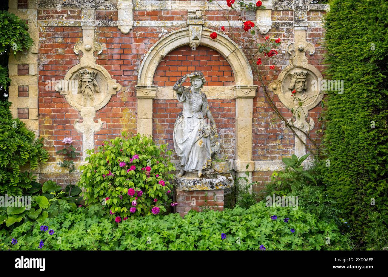 Sheperdess sculpture surrounded by flowers in the gardens at ...
