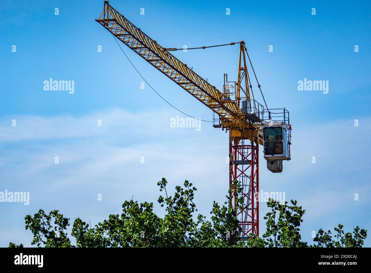 Yellow industrial crane hoist hi-res stock photography and images - Alamy