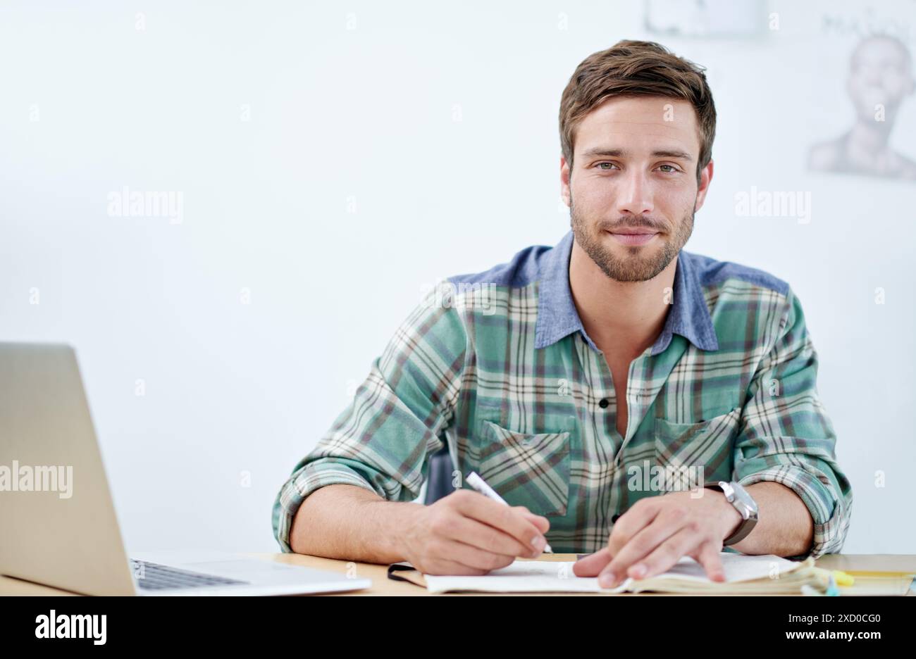 Office, portrait and man with book at desk for project sketching ...