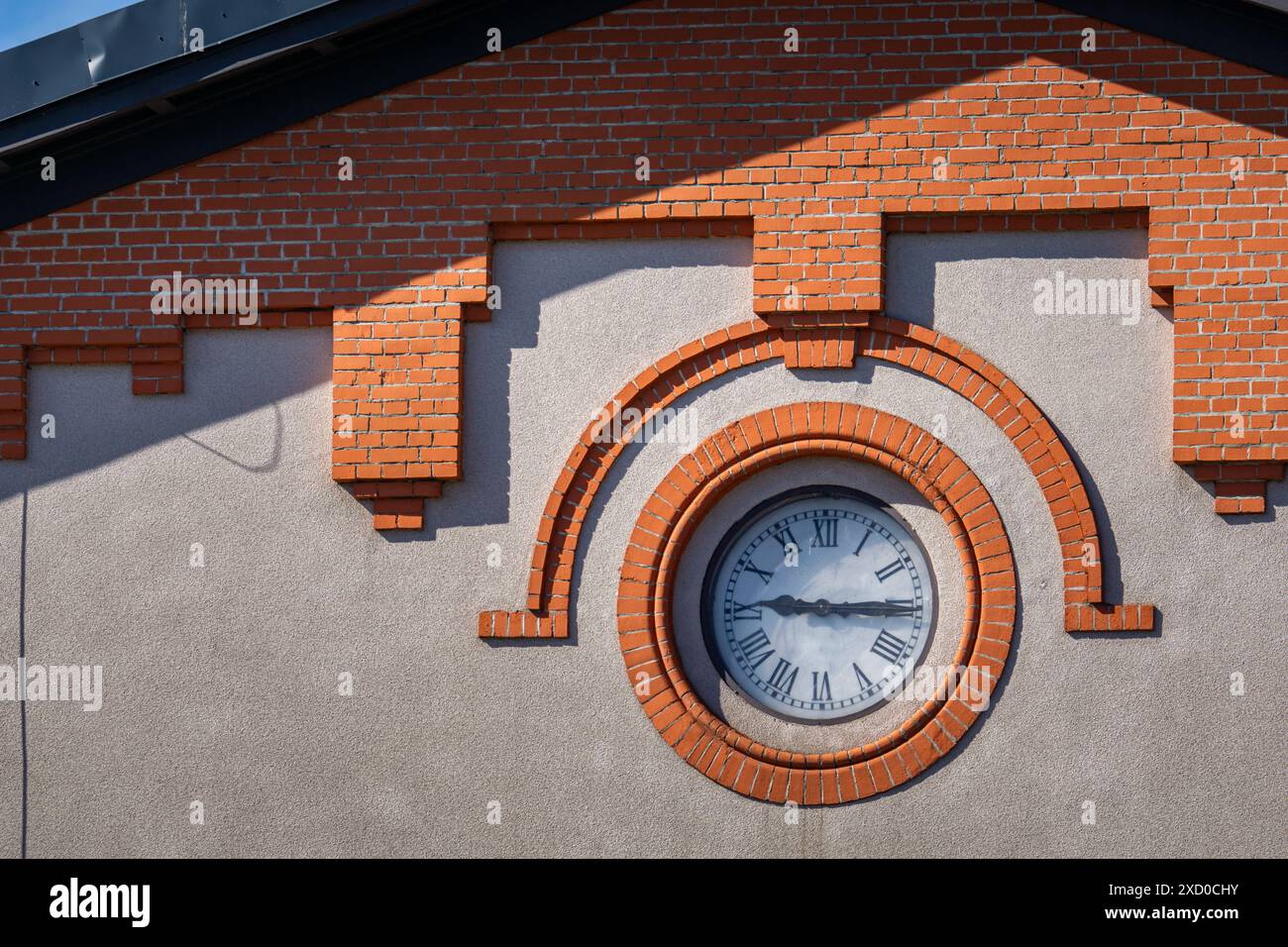 Red Brick Wall Clock Face on Building in Daylight Stock Photo - Alamy