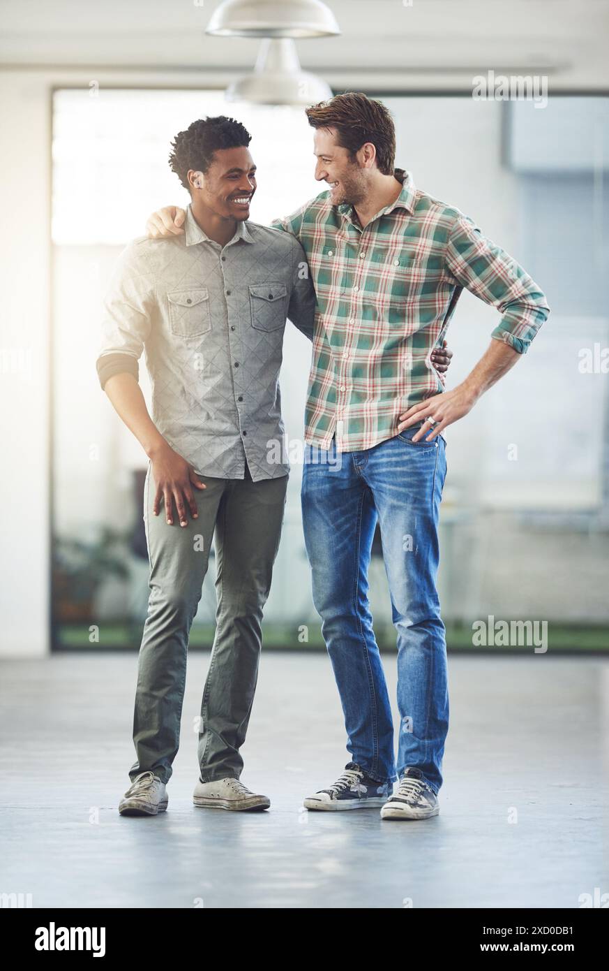 Talking, hug and business men in office with support for collaboration ...