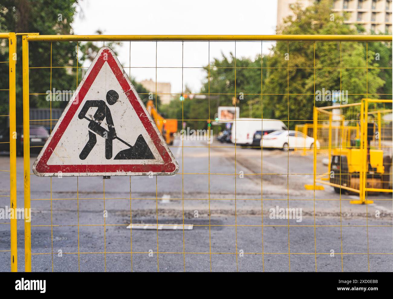 Road works sign in a city. Work in progress Stock Photo - Alamy