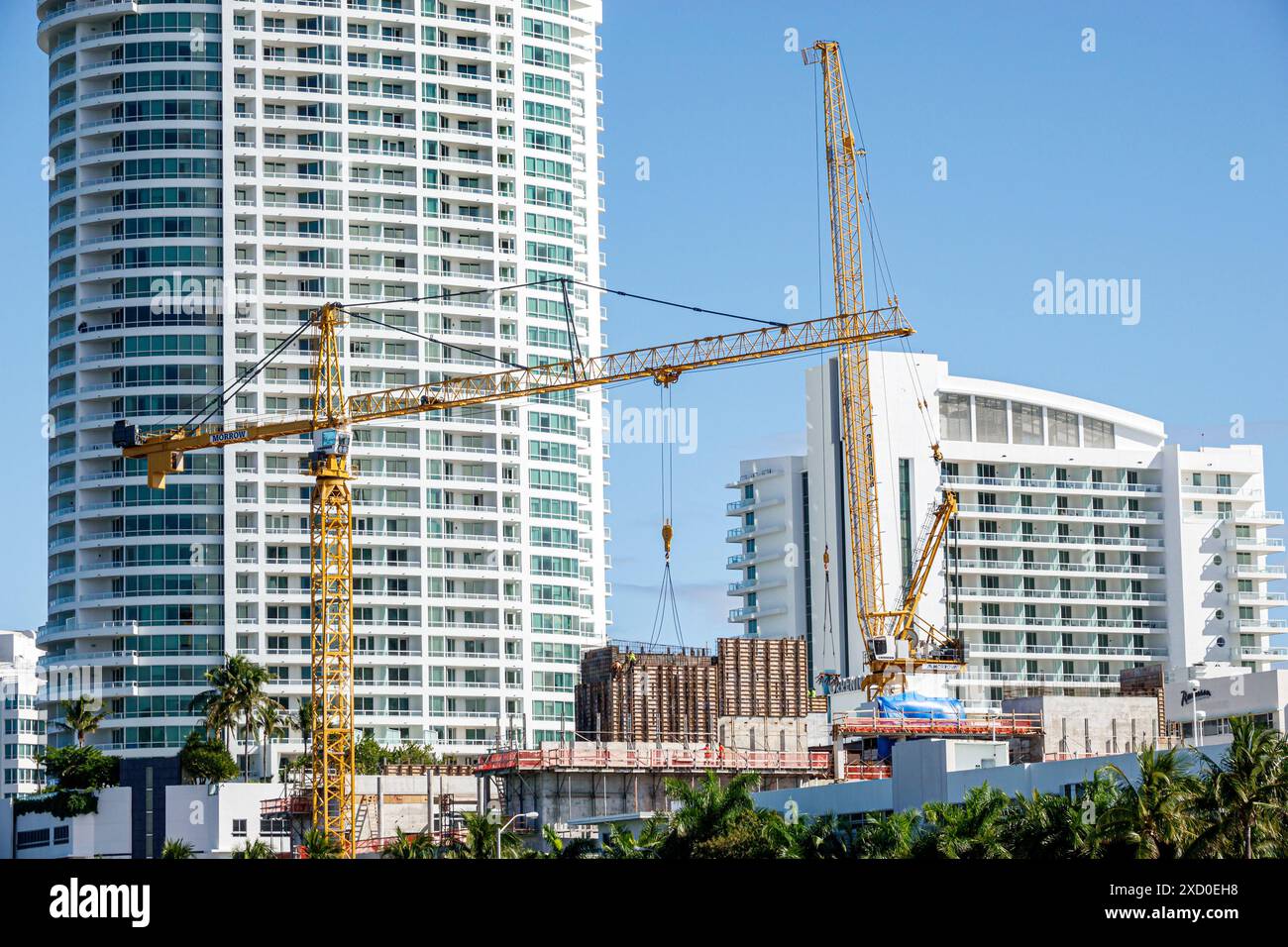 Construction cranes in miami beach hi-res stock photography and images ...