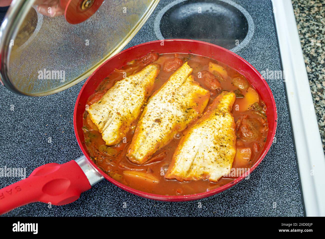 Stove stovetop cooking fish hi-res stock photography and images - Alamy