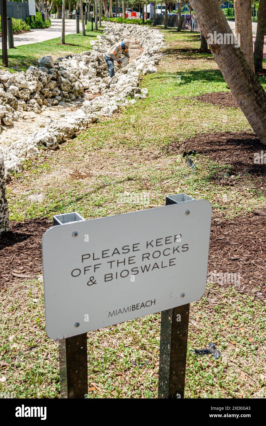 Miami Beach Florida,Canopy Park,sign keep off bioswale coral rocks ...