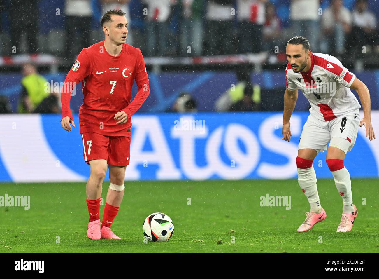 Kerem Akturkoglu (7) of Turkey and Giorgi Kochorashvili (6) of Georgia pictured in action during ...