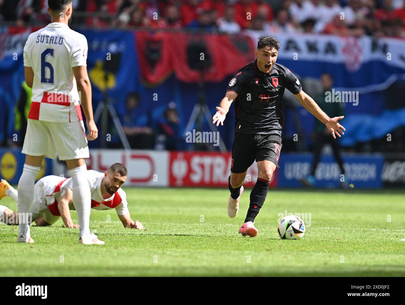 Hamburg. 19th June, 2024. Qazim Laci (R) of Albania competes during the ...