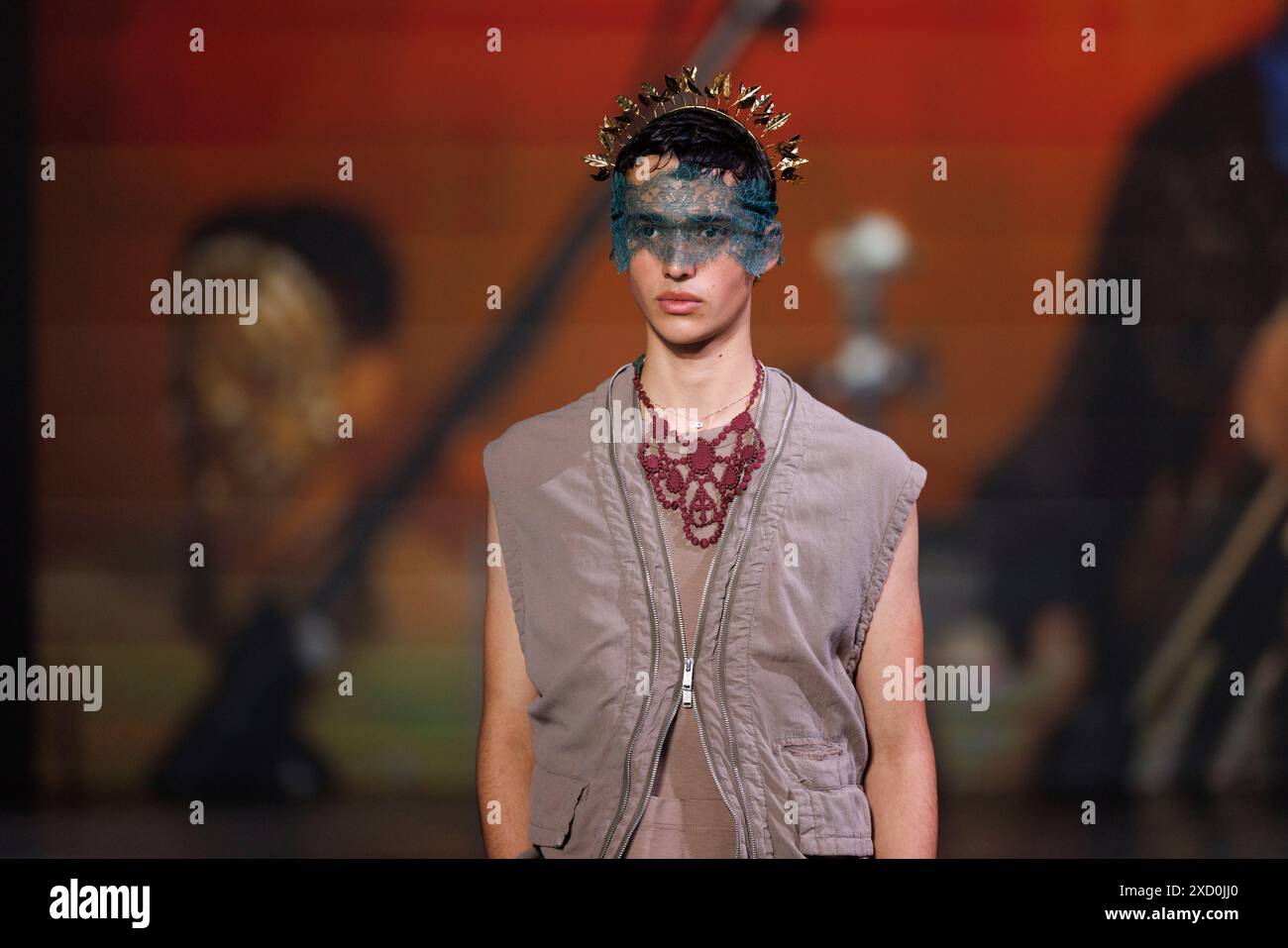 A model wears a creation for the Undercover Spring Summer 2025 ...