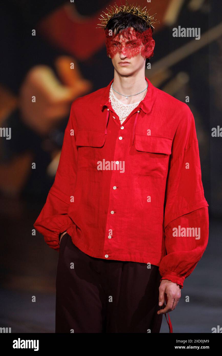 A model wears a creation for the Undercover Spring Summer 2025 ...