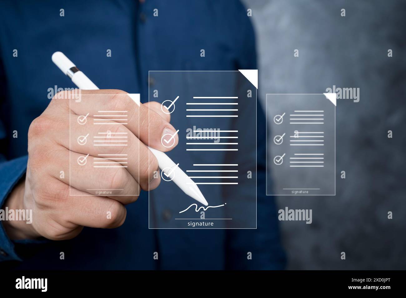 Electronic signature and paperless office concept. A businessman uses a ...