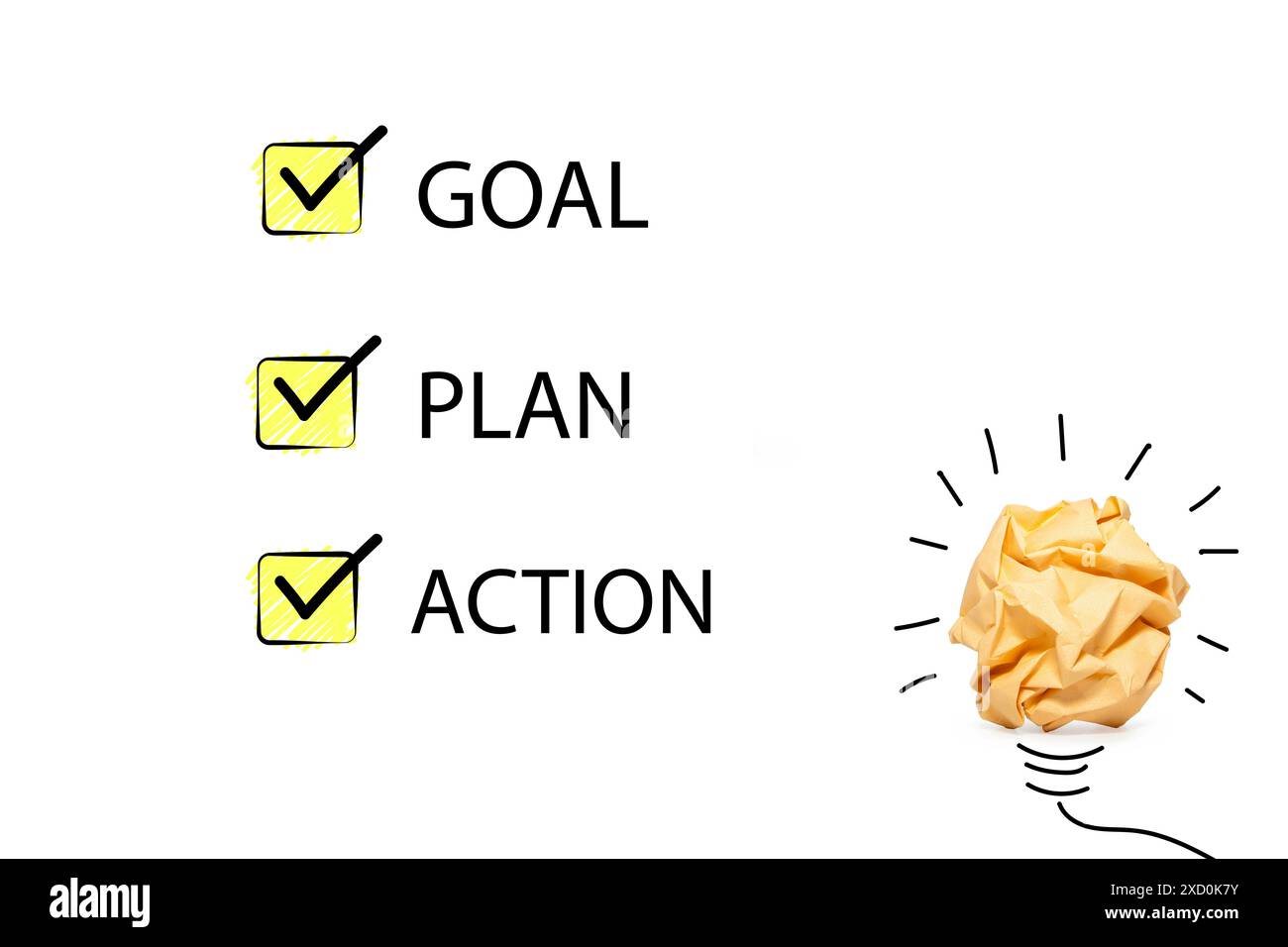 A white background with a yellow paper ball on it. The paper ball is ...