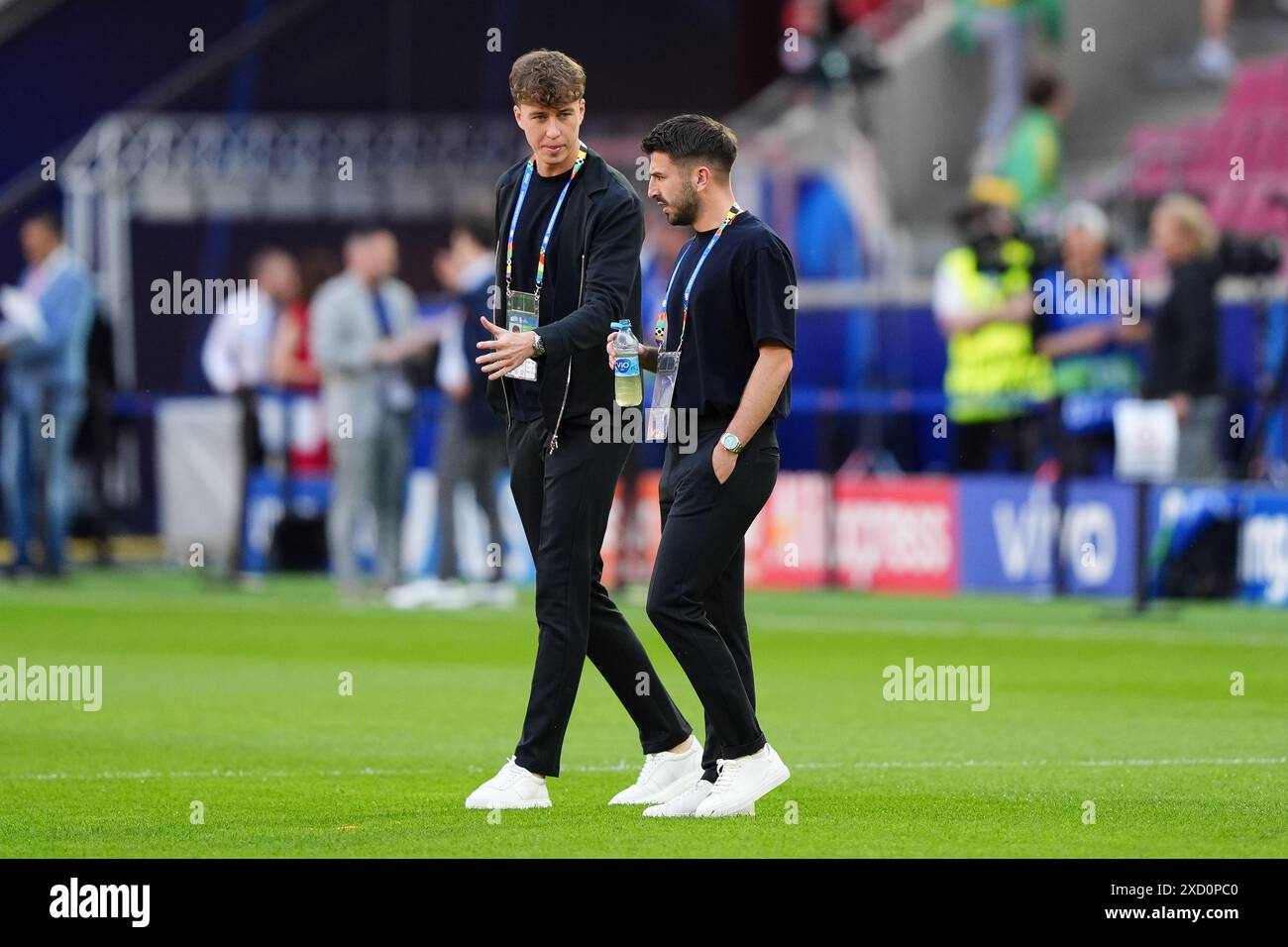 Scotland's Jack Hendry (left) and Greg Taylor inspect the pitch ahead ...