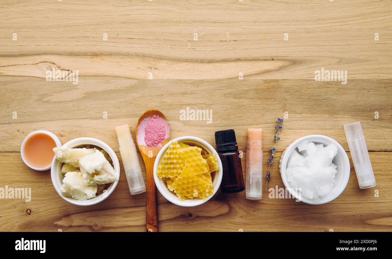 Ingredients for homemade lip balm: shea butter, essential oil, mineral ...