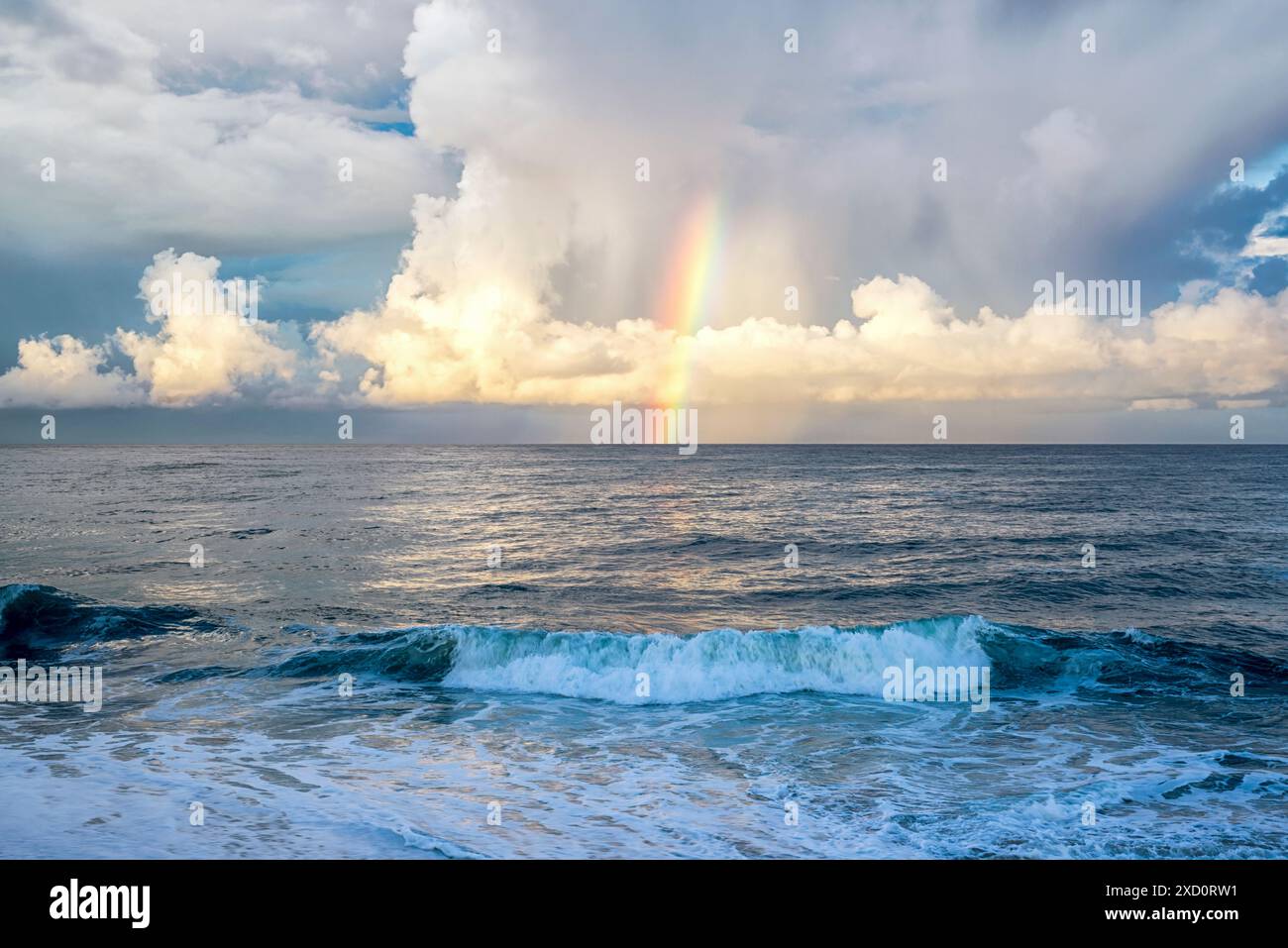 Rainbow forming during a clearing storm. La Jolla, California, USA ...
