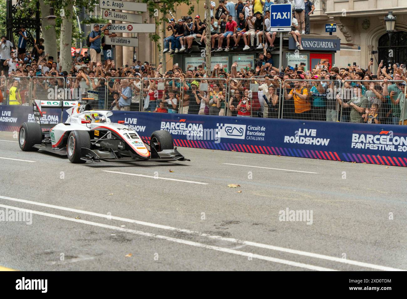 Barcelona, Spain. 19th June, 2024. Sports cars and Formula 1 cars drive along Passeig de Grˆcia ...