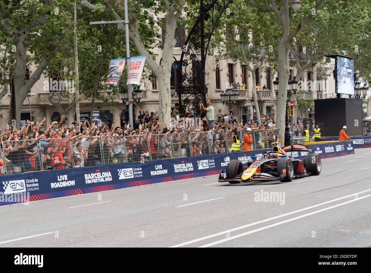 Barcelona, Spain. 19th June, 2024. Sports cars and Formula 1 cars drive along Passeig de Grˆcia ...