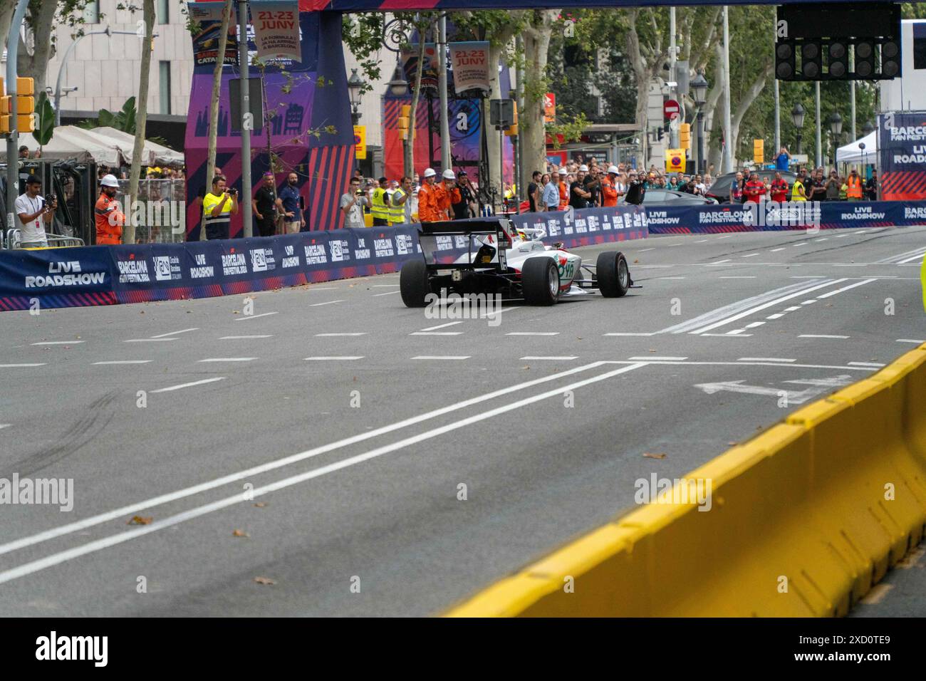 Barcelona, Spain. 19th June, 2024. Sports cars and Formula 1 cars drive along Passeig de Grˆcia ...