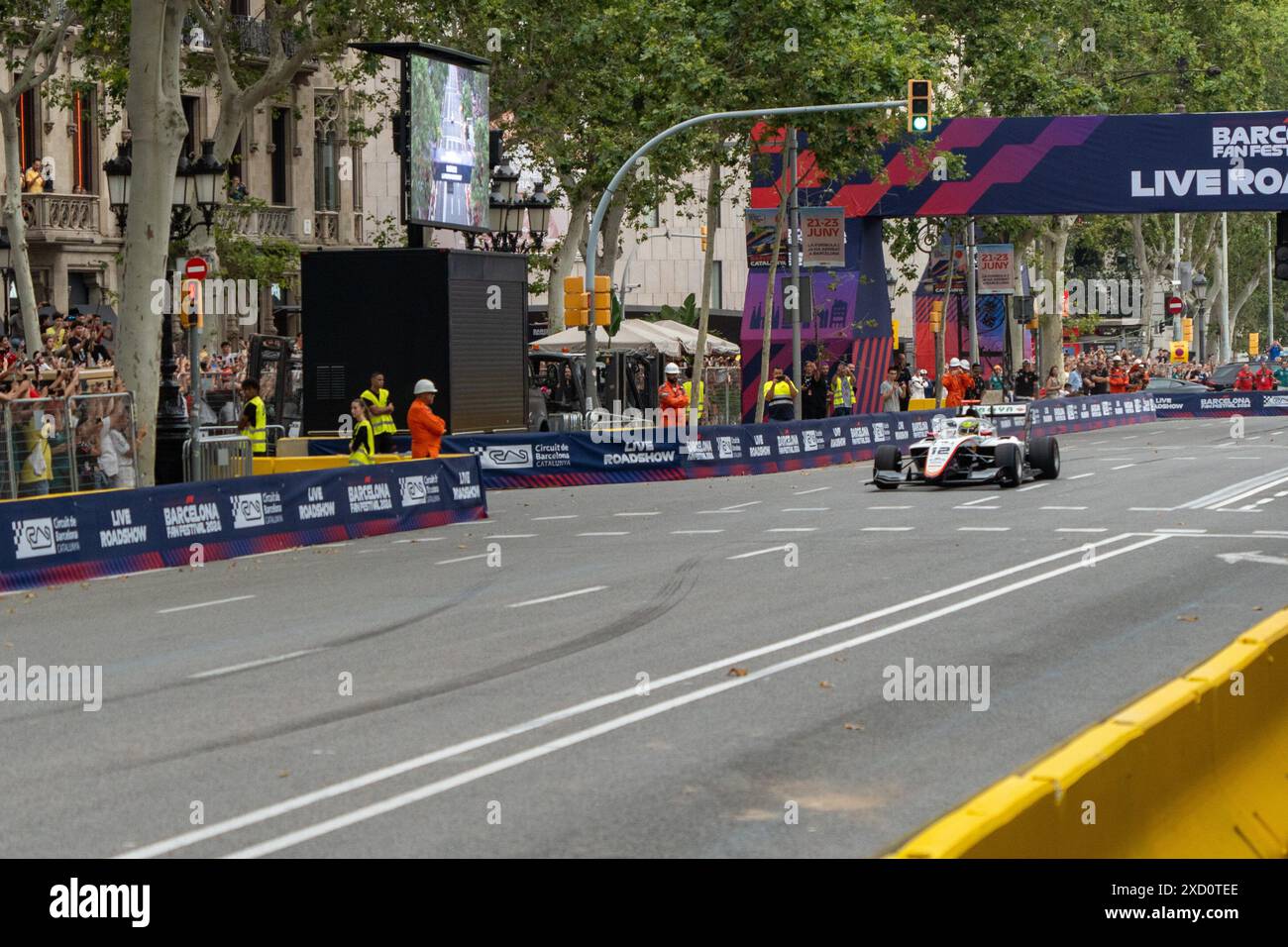 Barcelona, Spain. 19th June, 2024. Sports cars and Formula 1 cars drive along Passeig de Grˆcia ...
