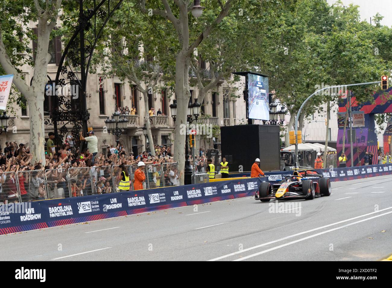 Barcelona, Spain. 19th June, 2024. Sports cars and Formula 1 cars drive along Passeig de Grˆcia ...