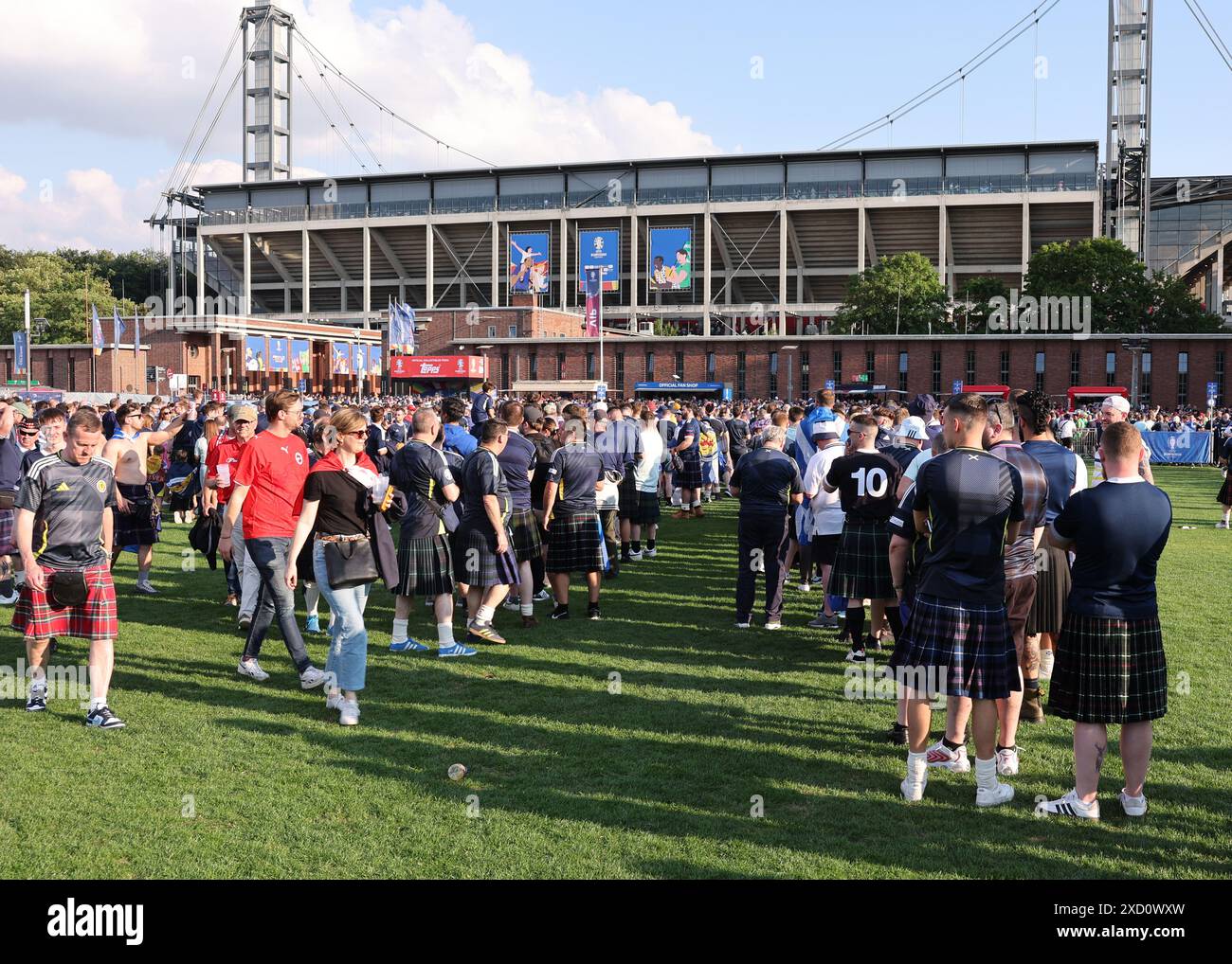 Cologne, Germany. 19th June, 2024. Fans queuing to go onto the stadium ...