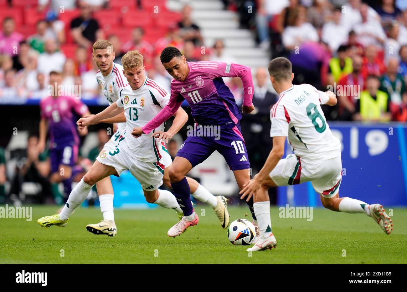 Germany’s Jamal Musiala in action against Hungary’s Andras Schafer ...