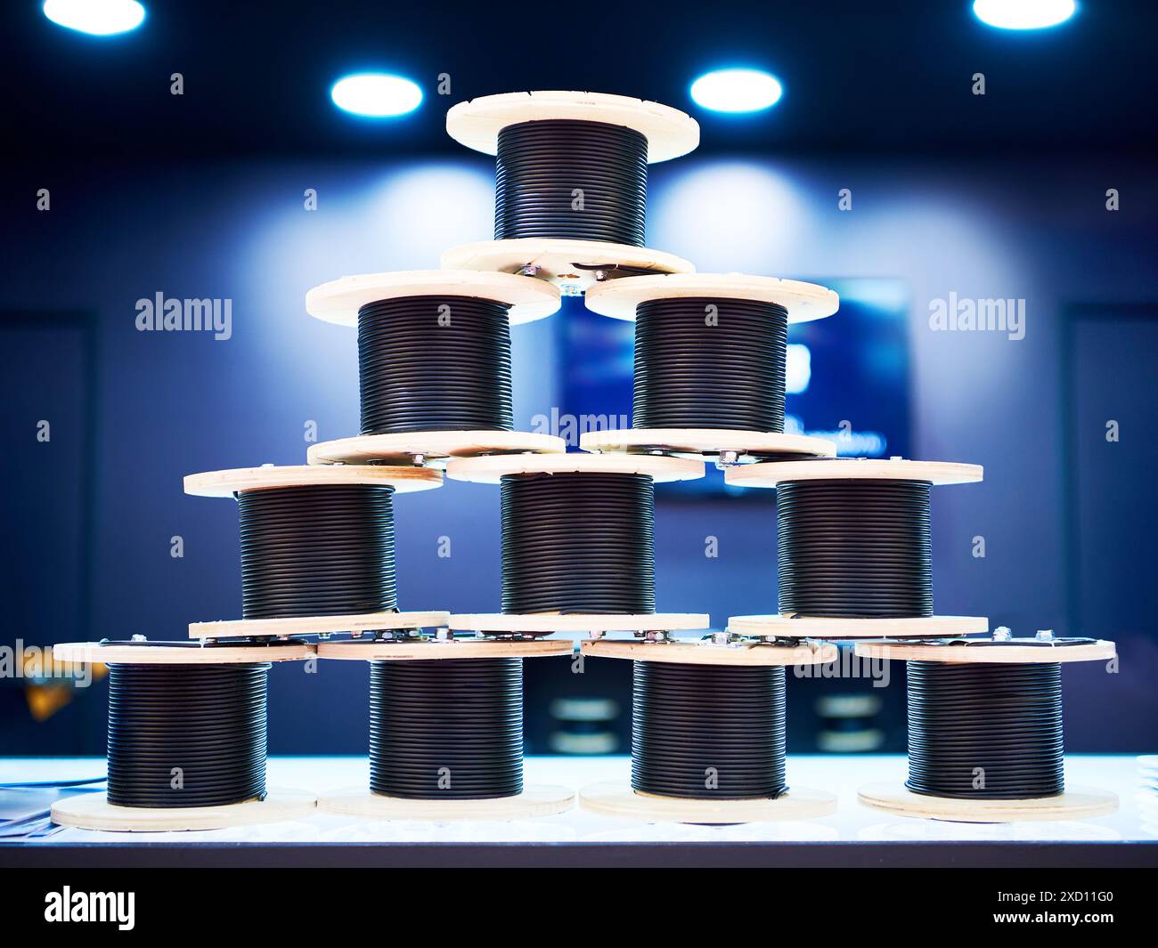 Pyramid of spools with optical cable on display in a store Stock Photo ...