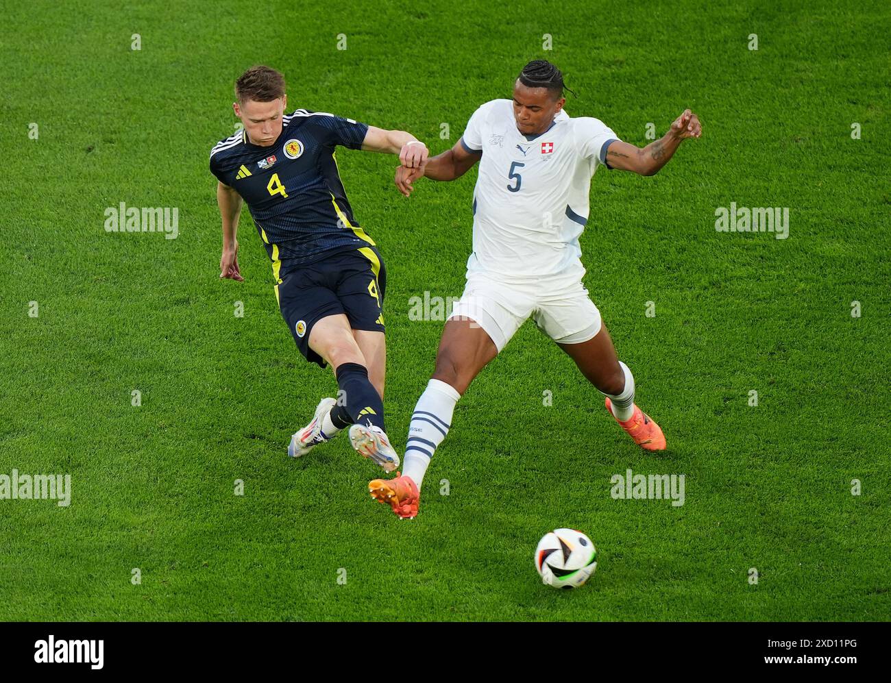 Scotland's Scott McTominay (left) and Switzerland's Manuel Akanji ...