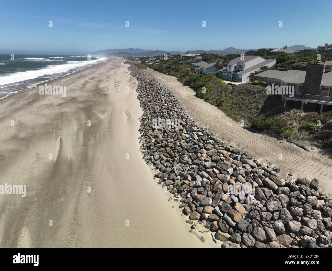 Beach erosion, mitigation,restoration and riprap construction at ...