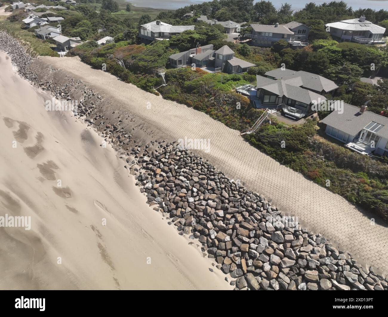 Beach erosion, mitigation,restoration and riprap construction at ...