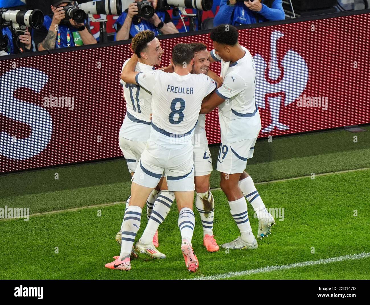 Switzerland's Xherdan Shaqiri (second right) celebrates scoring their ...