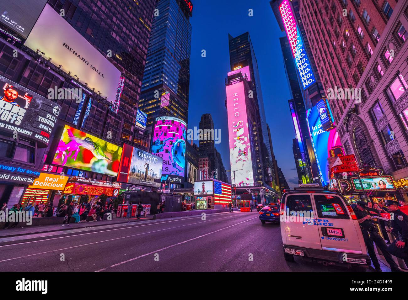 Beautiful night view of Broadway in Times Square with a parked police ...