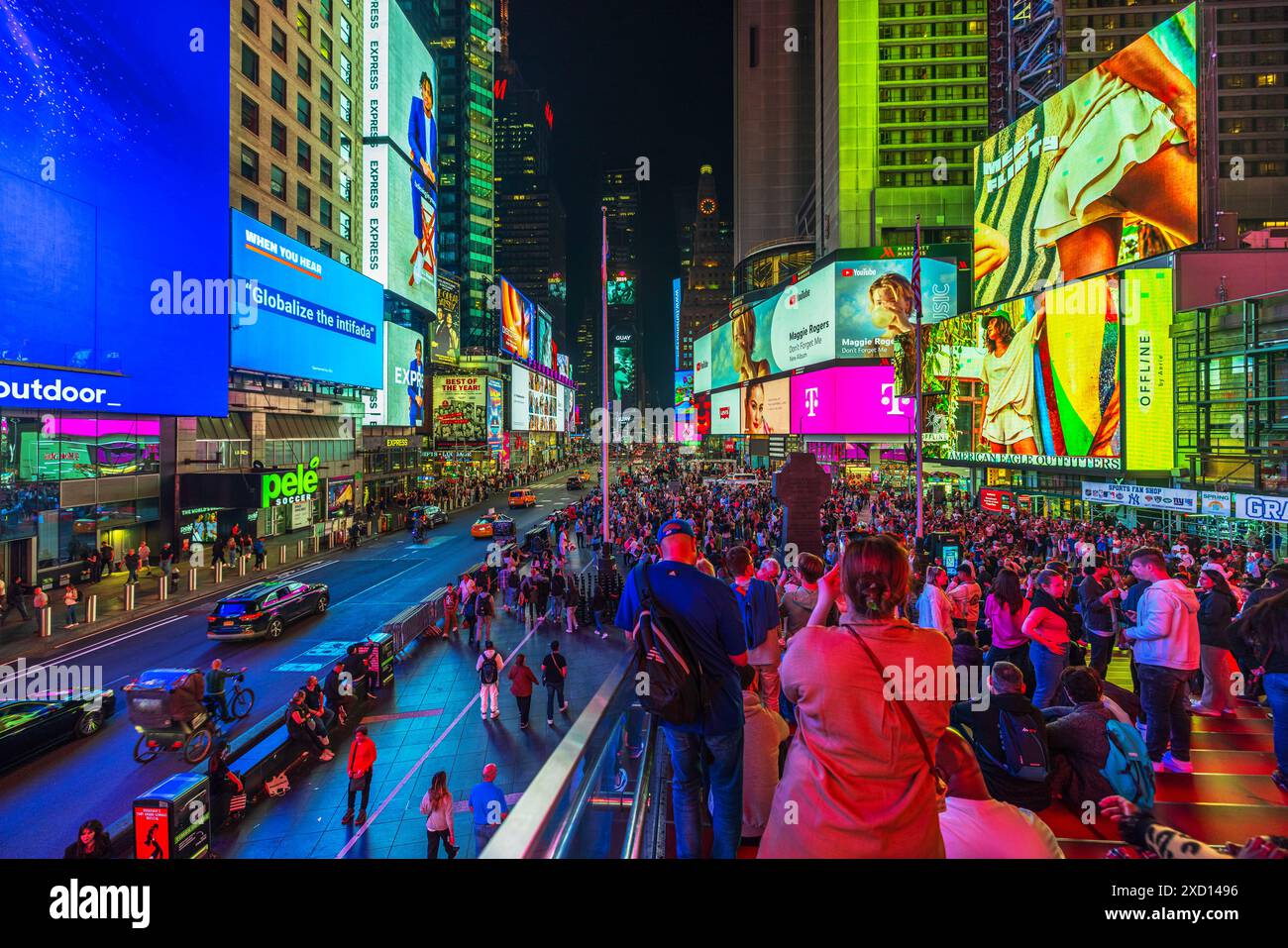Stunning night view from the Red Steps in Times Square, where people ...