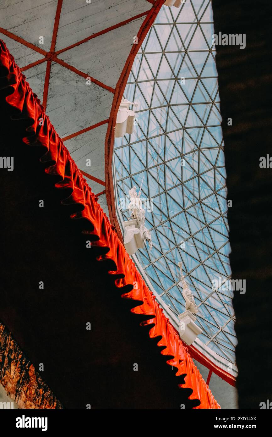 A view of the glass dome with statues in the Salvador Dali gallery ...