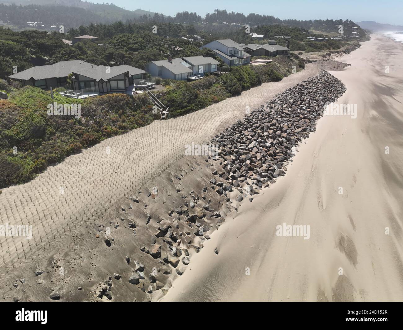 Beach erosion, mitigation,restoration and riprap construction at ...