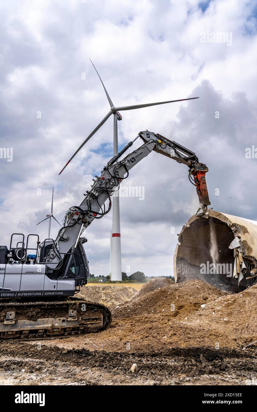 Demolished tower of a 20 year old wind turbine, in the Werl wind farm ...