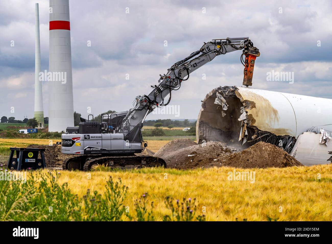 Demolished tower of a 20 year old wind turbine, in the Werl wind farm ...