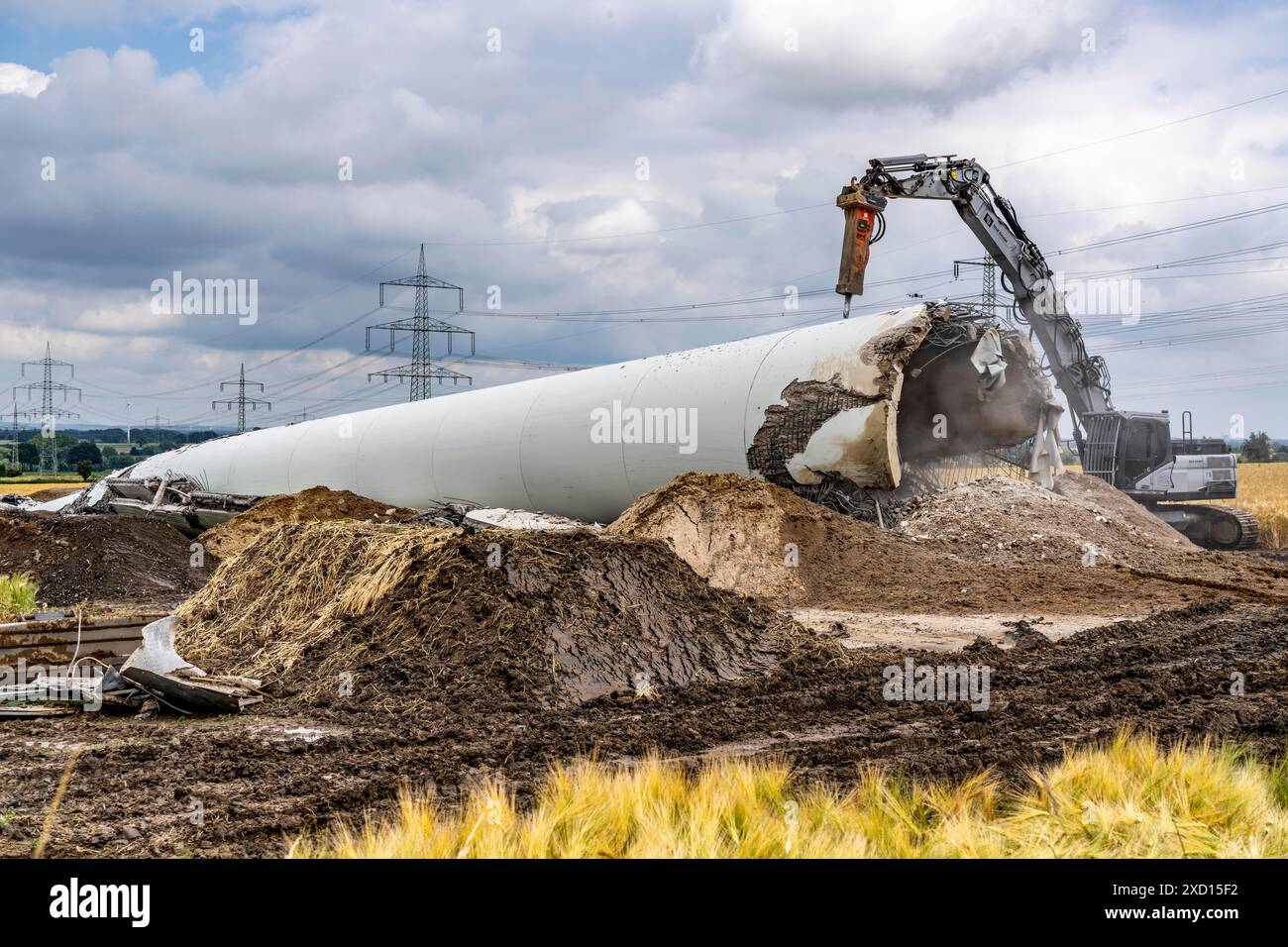 Demolished tower of a 20 year old wind turbine, in the Werl wind farm ...