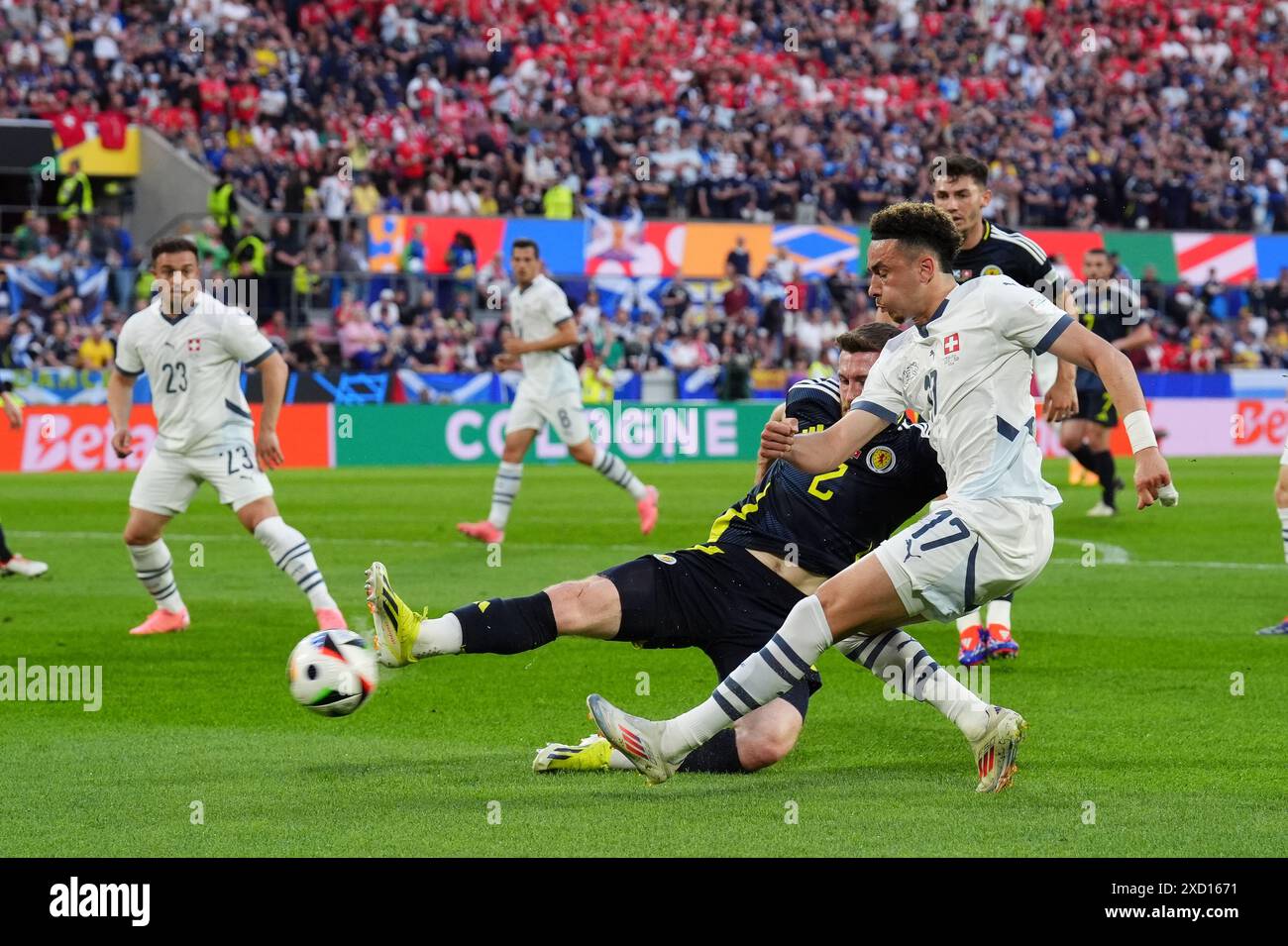 Switzerland's Ruben Vargas (right) attempts a shot on goal under ...