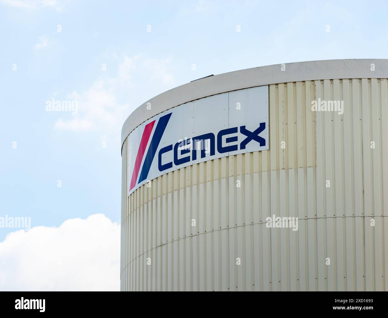 Cemex logo sign on an industrial building like a silo. The company ...