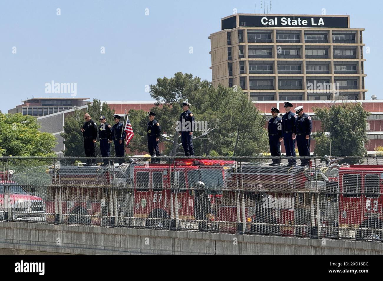 Los Angeles County and Monterey Park Fire Dept. firefighters stand in ...
