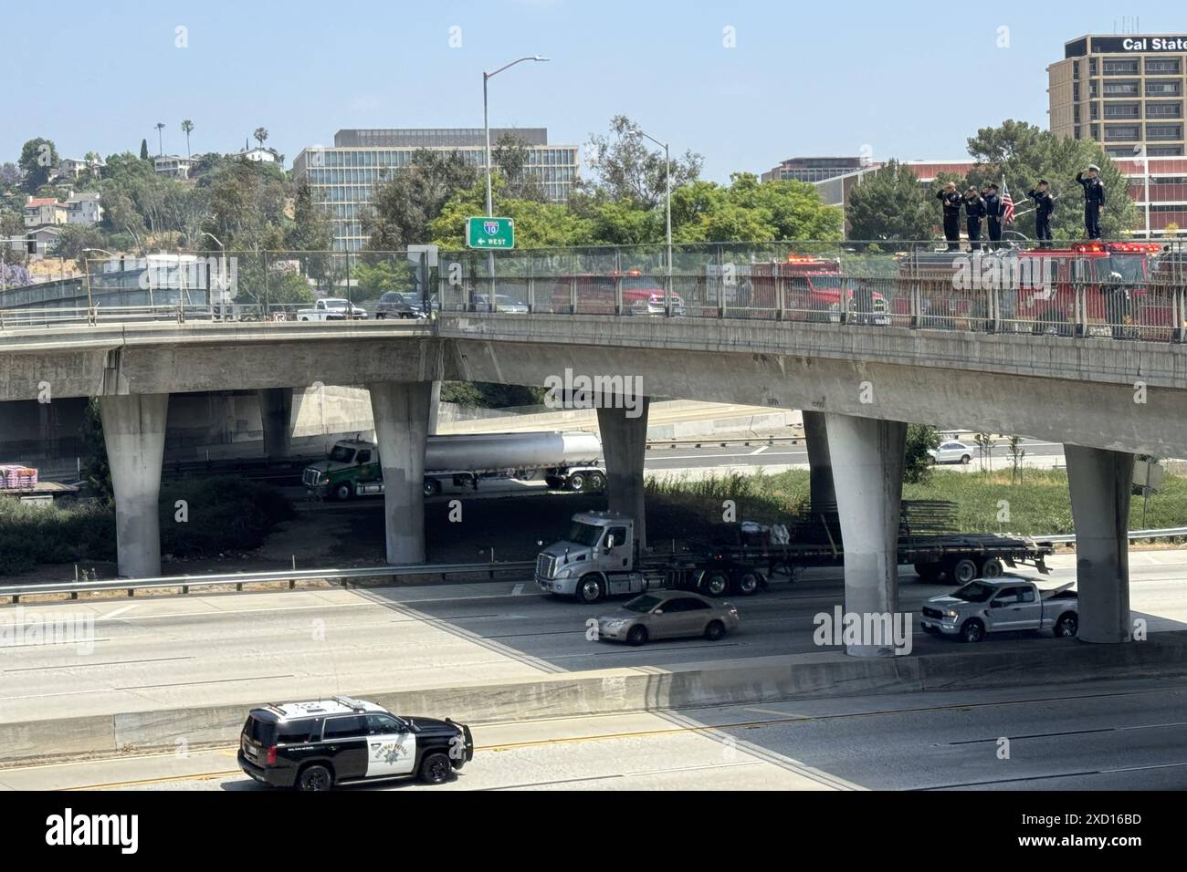 Los Angeles County and Monterey Park Fire Dept. firefighters stand in ...