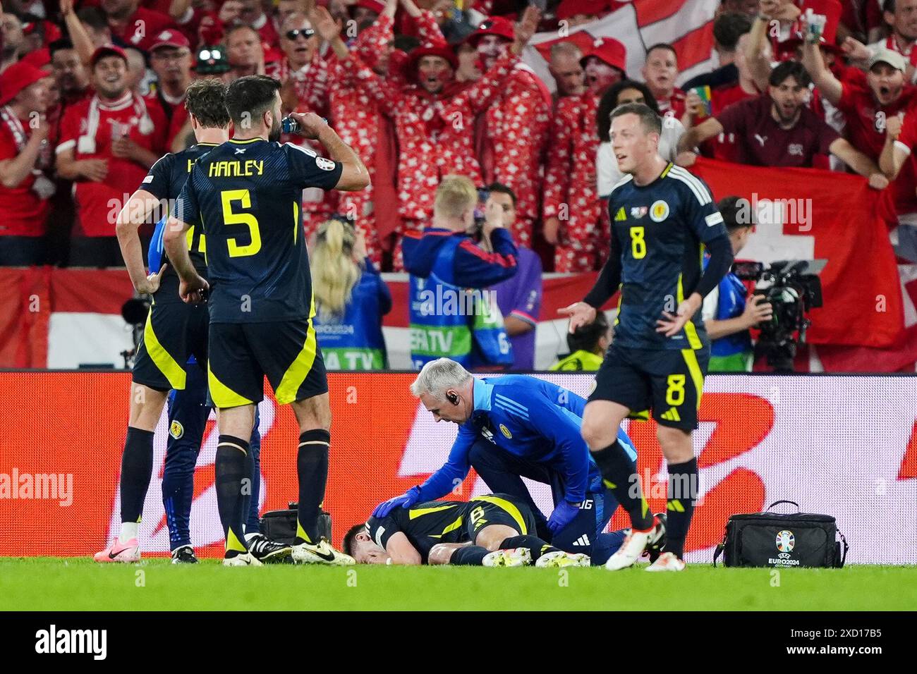 Scotland's Kieran Tierney receives treatment from medical staff after ...