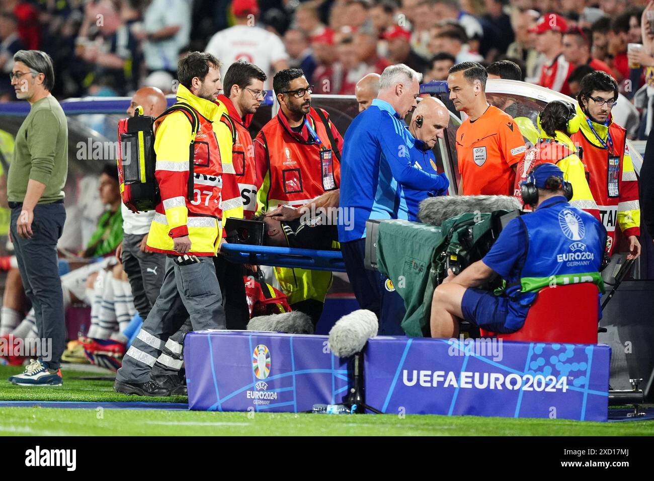 Scotland's Kieran Tierney leaves the pitch on a stretcher after going ...