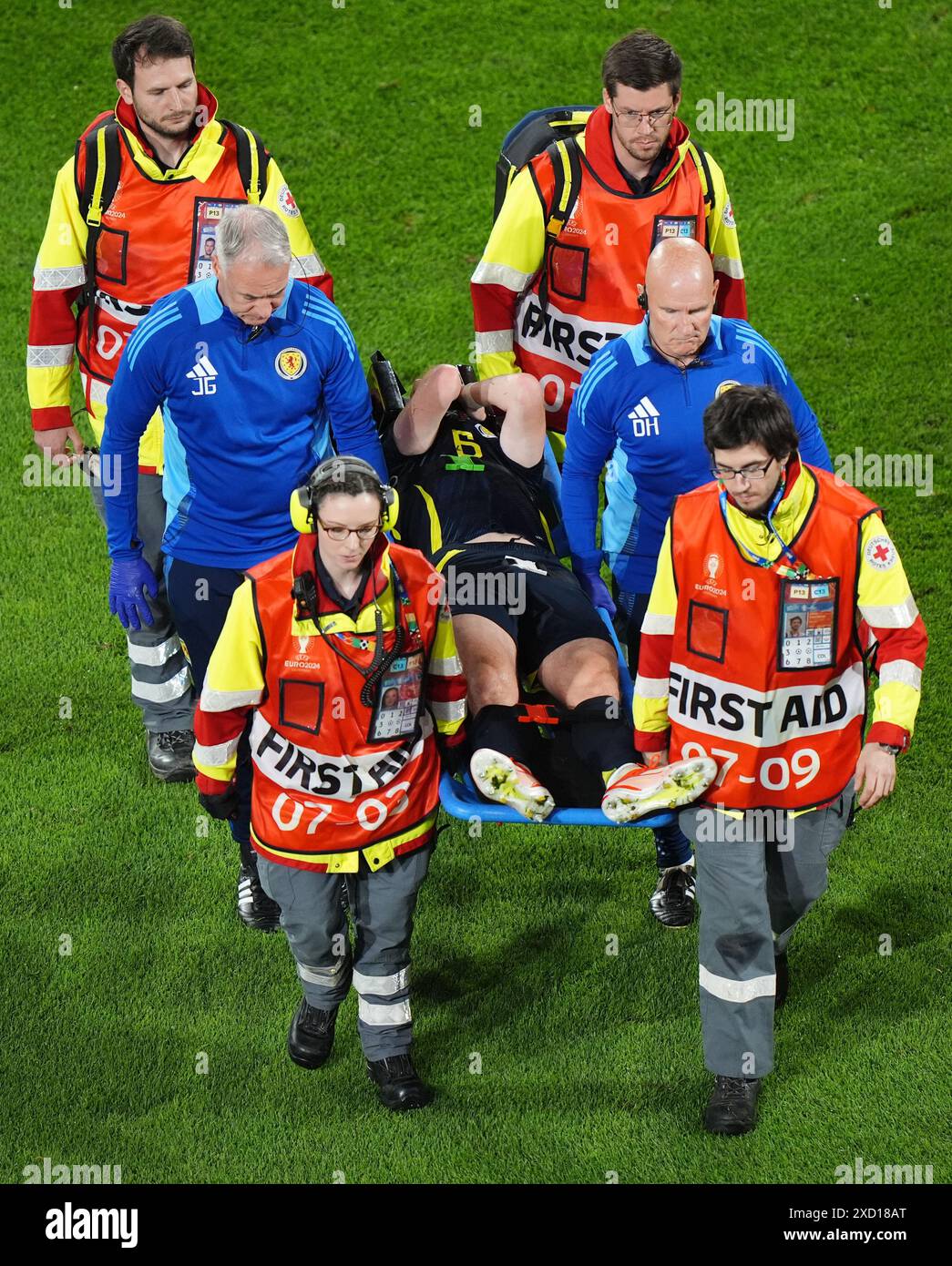 Scotland's Kieran Tierney is carried off the pitch on a stretcher after ...