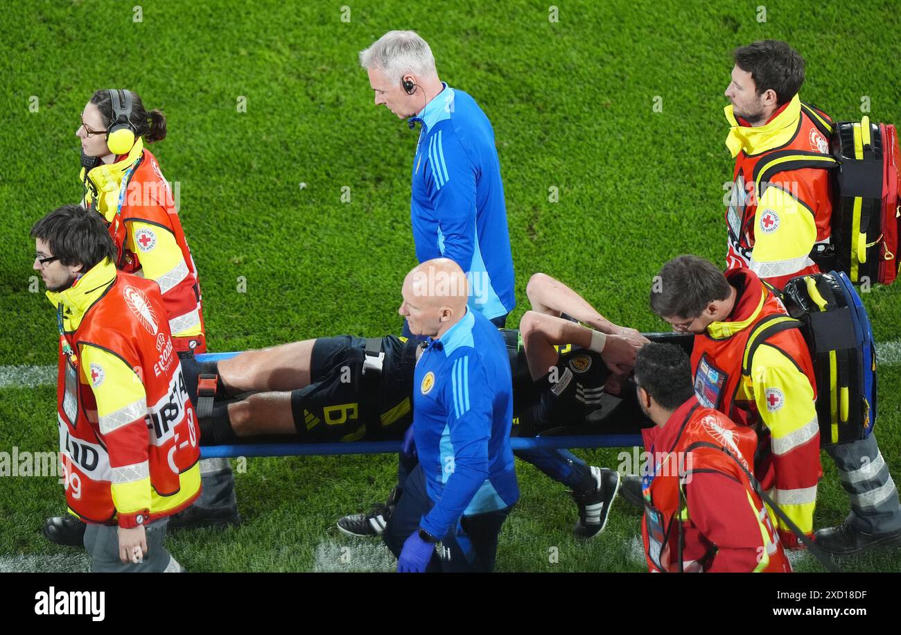 Scotland's Kieran Tierney is carried off the pitch on a stretcher after ...