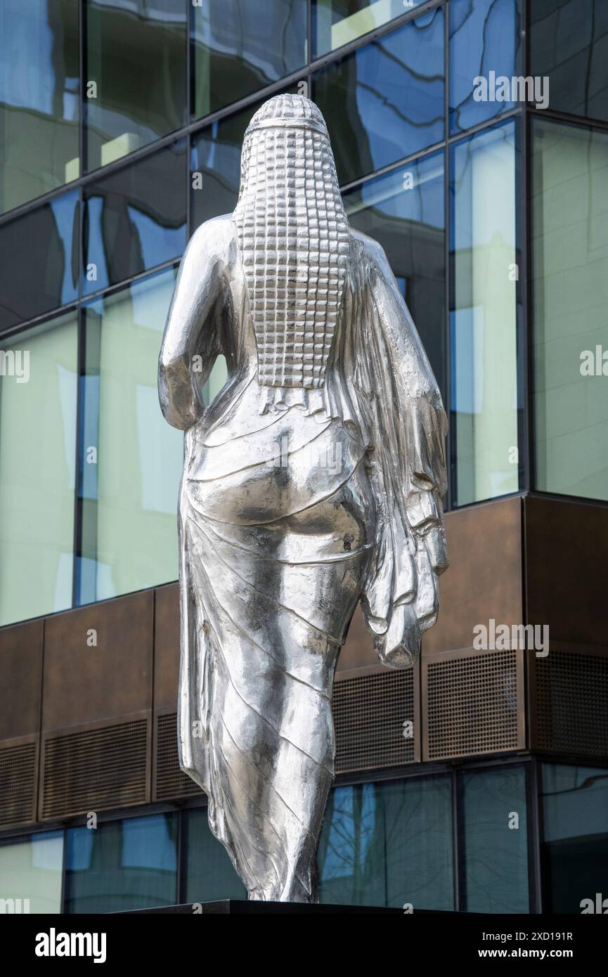 Statue of female figurine from behind at the waterfront boardwalk in ...