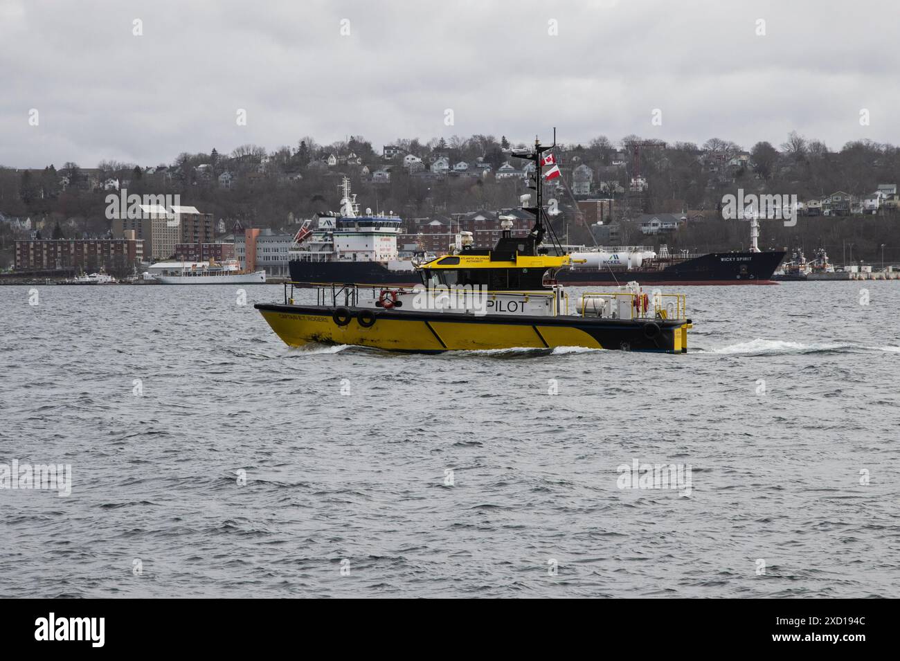 Yellow pilot boat in the harbour in Halifax, Nova Scotia, Canada Stock ...