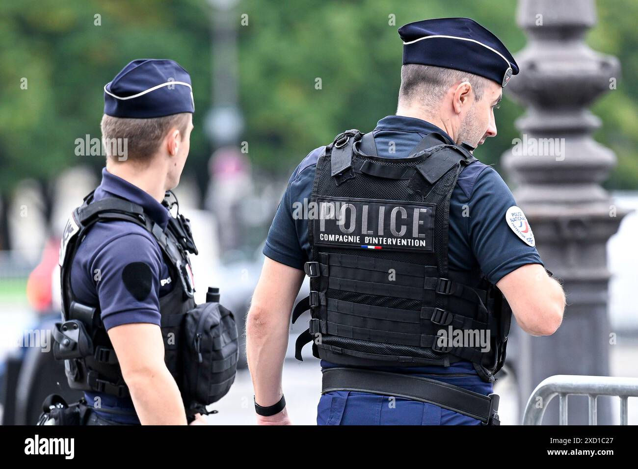 Paris, France. 12th June, 2024. Police officers with uniform ensuring ...