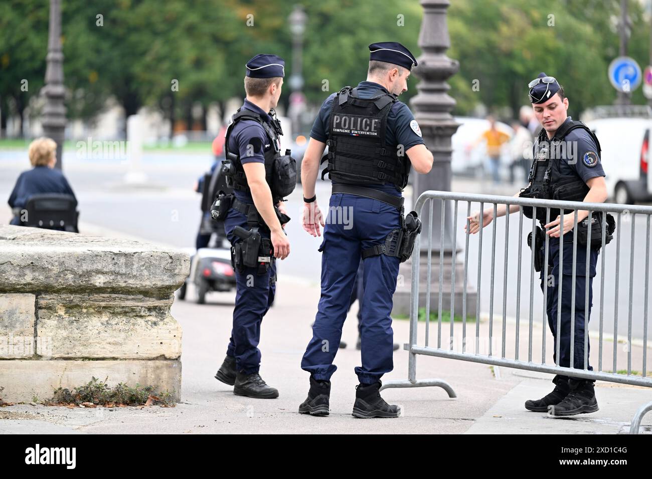 Paris, France. 12th June, 2024. Police officers with uniform ensuring ...